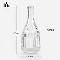 China Engraved 450ml/700ml/750ml Glass Bottle for Commercial Liquor Presentation in Clear for sale