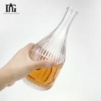 China Engraved 450ml/700ml/750ml Glass Bottle for Commercial Liquor Presentation in Clear for sale