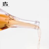 China Engraved 700ml 750ml Glass Liquor Bottle for Customized Alcohol and Spirits for sale