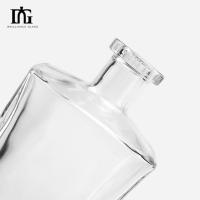 China 350ml/500ml/700ml Glass Clear Liquor Bottle with Black Cap in Europe Country for sale