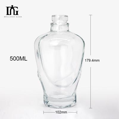 China Acceptable Customer's Logo 750ml Glass Liquor Bottle for Custom Clear Round Vodka for sale