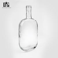 China 500ml Transparent Vodka Glass Bottle with Sealed Cork and Engraving Surface for sale