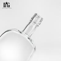 China 500ml Transparent Vodka Glass Bottle with Sealed Cork and Engraving Surface for sale