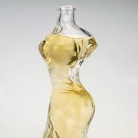 China Clear Woman Shape Bottle for Liquors and Beverage Engraved Glass Bottle 700ml for sale
