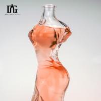 China Clear Woman Shape Bottle for Liquors and Beverage Engraved Glass Bottle 700ml for sale