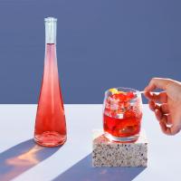 China Clear Glass Bottle with Rose Bottom Capacity 500ml/750ml Body Material Glass for sale