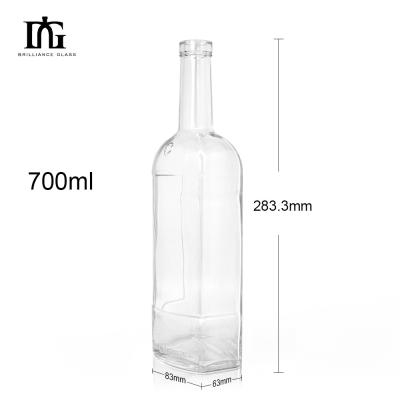 China 750ml 700ml 500ml Unique Shape Vodka Spirit Gin Rum Clear Glass Liquor Bottle with Cork for sale