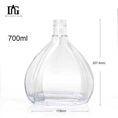 China Transparent Round 700ml 750ml Glass Vodka Whisky Rum Bottle with Screw Cap and Sample for sale