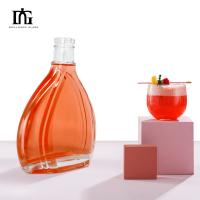 China Transparent Round 700ml 750ml Glass Vodka Whisky Rum Bottle with Screw Cap and Sample for sale