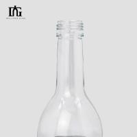 China Provided Freely Sample Acceptable OEM/ODM 750ml Glass Wine Bottle with Design and Cork Stopper for sale
