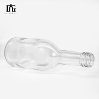 China Provided Freely Sample Acceptable OEM/ODM 750ml Glass Wine Bottle with Design and Cork Stopper for sale