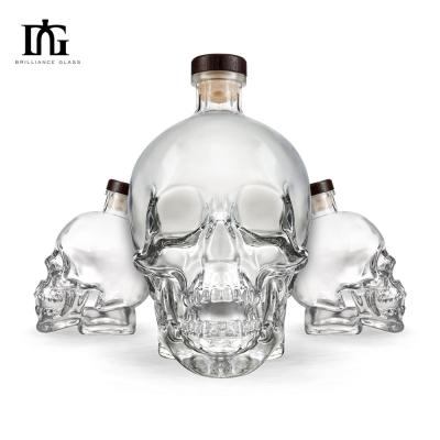 China Skull Glass Bottle for Beer Screen Printing Hot Stamping Painting Engraving and More for sale