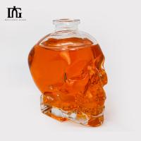 China Skull Glass Bottle for Beer Screen Printing Hot Stamping Painting Engraving and More for sale