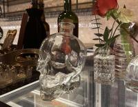 China Skull Glass Bottle for Beer Screen Printing Hot Stamping Painting Engraving and More for sale
