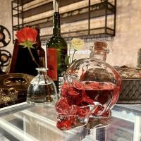 China Skull Glass Bottle for Beer Screen Printing Hot Stamping Painting Engraving and More for sale