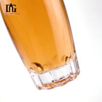 China 500ml/700ml/750ml Capacity Glass Whiskey Bottle with Cork and Unique Design for sale