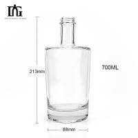 China Custom Engraved Hot Stamping Glass Bottle 700ml 750ml Whiskey Vodka Thick Bottom for sale