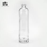 China OEM/ODM Acceptable 750ml Vodka Liquor Glass Bottle with Metal Lid and Cork Screw Cap for sale