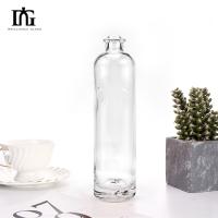 China OEM/ODM Acceptable 750ml Vodka Liquor Glass Bottle with Metal Lid and Cork Screw Cap for sale