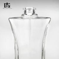 China Glass Beverage Bottle with Gold Cork Screw Cap Transparent Vodka Glass Bottle Beer for sale