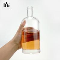 China Collar Material Glass 500ml/700ml Round Shape Empty Liquor Bottles with Cork Stoppers for sale