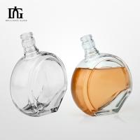 China Transparent Beverage Glass Bottle with Gold Caps Frosting Surface Sophistication for sale