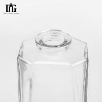 China Custom Made Unique Design 500ml Bottle Engraved Triangle Tequila Glass Bottle with Lid for sale