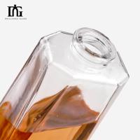China Custom Made Unique Design 500ml Bottle Engraved Triangle Tequila Glass Bottle with Lid for sale