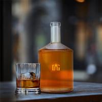 China Sample Provided Freely 700ml Glass Bottle for Gin Whisky Spirit Vodka Brandy Packing for sale