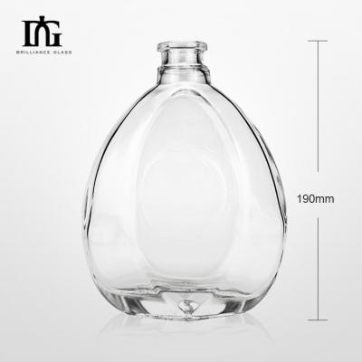 China 700ml Extra Flint Glass Bottle With Wooden Stopper For Gin Vodka Rum Liquor Spirits for sale