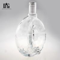 China Custom 700Ml Round Flint Glass Liquor Wine Whisky Vodka Tequila Bottle With Cork Lid for sale