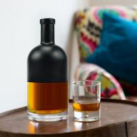 China 750ml Custom Matte Black Glass Wine Bottle Ideal for Champagne and Red Wine Packaging for sale