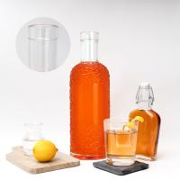 China Acid Etch Surface Handling Glass Bottle for Beverages 750ml Capacity and Transparent for sale