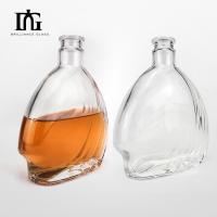China Engraving Surface Handling 500ml Shaped Empty Glass Liquor Bottle for Champagne for sale