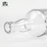 China Gold Stamp Printing Handling Special Glass Drinking Bottle for Sample 350ml 500ml 750ml for sale