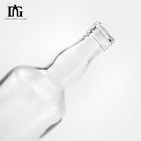 China Gold Stamp Printing Handling Special Glass Drinking Bottle for Sample 350ml 500ml 750ml for sale