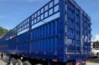 China 4 Axle Fence-Type Cargo Semi-Trailer with 80 Tons Payload and Heavy-Duty Mechanical Spring Suspension for sale