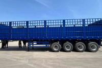 China 4 Axle Fence-Type Cargo Semi-Trailer with 80 Tons Payload and Heavy-Duty Mechanical Spring Suspension for sale
