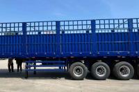 China 4 Axle Fence-Type Cargo Semi-Trailer with 80 Tons Payload and Heavy-Duty Mechanical Spring Suspension for sale