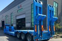 China 100-ton Payload Detachable Lowbed Semi Trailer with Reinforced Structure and Mechanical Loading Ladder for sale