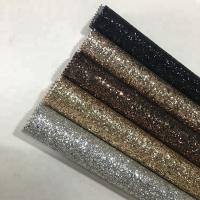 China Pu Synthetic Glitter Leather Fabric Hair Ornament Applied 0.8±0.15mm Thickness for sale