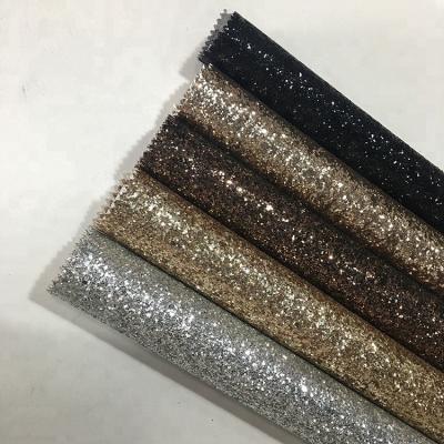 China Pu Synthetic Glitter Leather Fabric Hair Ornament Applied 0.8±0.15mm Thickness for sale