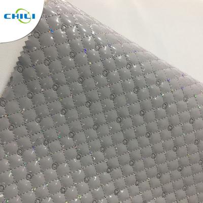 China Shine Quilted Leatherette Fabric , Vinyl Leather Fabric Floral Soft Pleated for sale