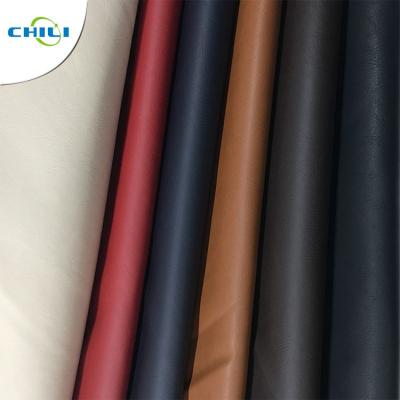 China Solid Color PU Leather Fabric Waterproof Woven Backing Design Smooth for sale