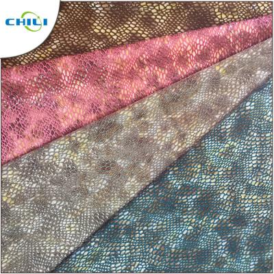 China Flexible Faux Vinyl Fabric , Quilted Pleather Fabric Stretch Imitation Patterned for sale