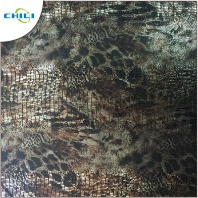 China Green Printed Faux Leather Fabric High Stretch Performance Flame Retardant for sale