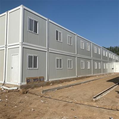 China 20ft Rain And Wind Proof Garage Storage Container House 2 Floor Prefabricated Flat Pack Container for sale