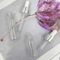 China 10ml 15ml Glass Cosmetic Bottles Straight Shape With Aluminum Oil Dropper for sale
