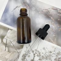 China Amber 30ml Glass Cosmetic Bottles Essential Oil With Ratchet Closure Dropper for sale