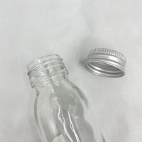 China Non Spill Skin Care Cosmetic Packaging 60ml Glass Bottle With Aluminum Cap for sale